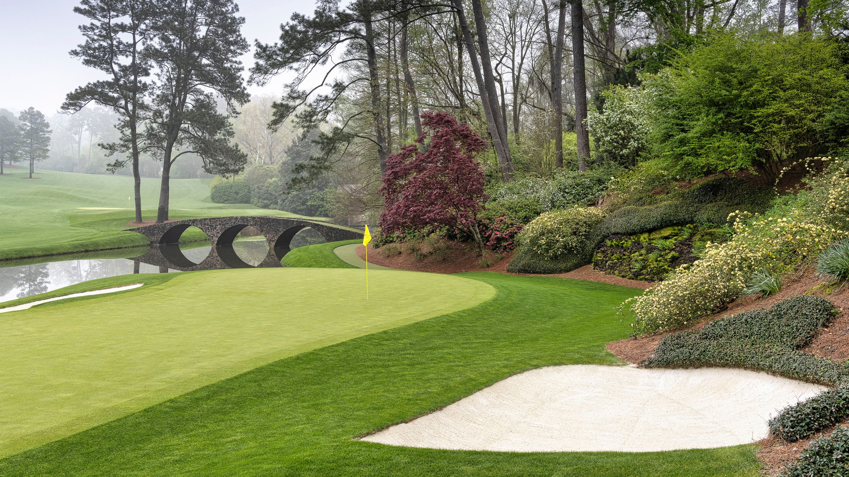 The No.12 hole with the Hogan Bridge in the morning fog at Augusta ...