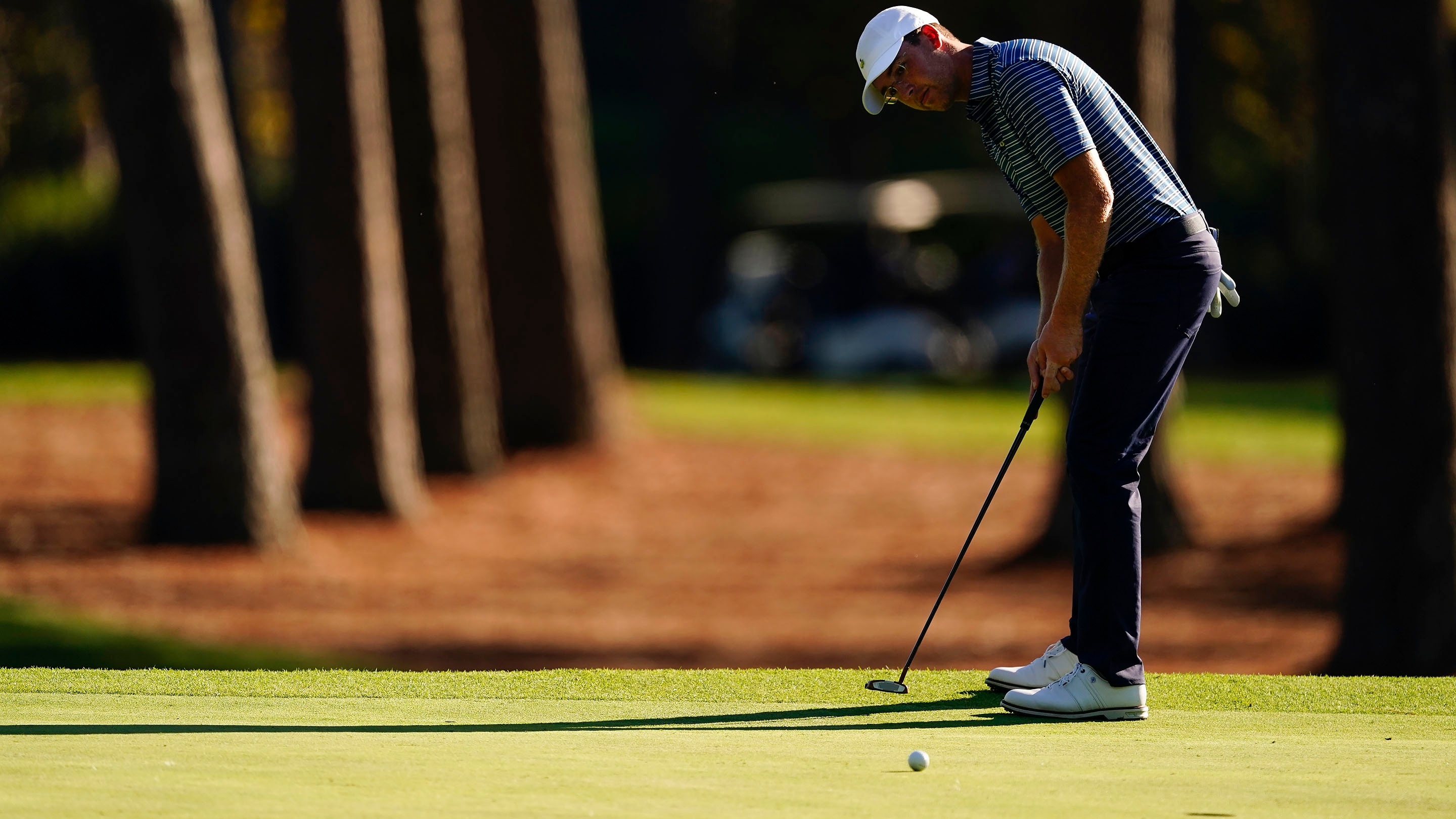 Amateur Andy Ogletree putts on the No. 3 green during Round 2 of the ...