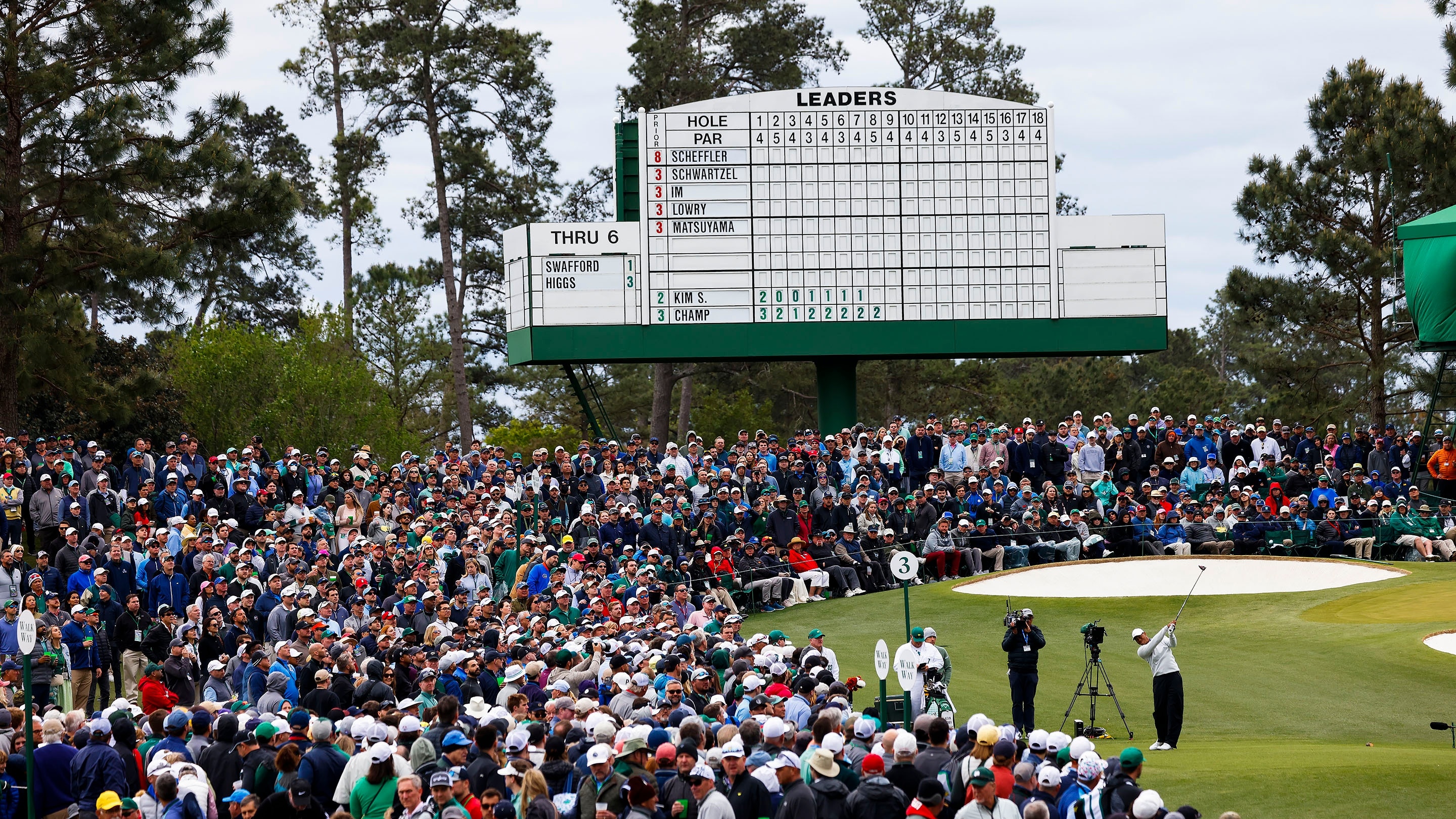 Masters champion Tiger Woods plays a stroke from the No. 3 tee during ...