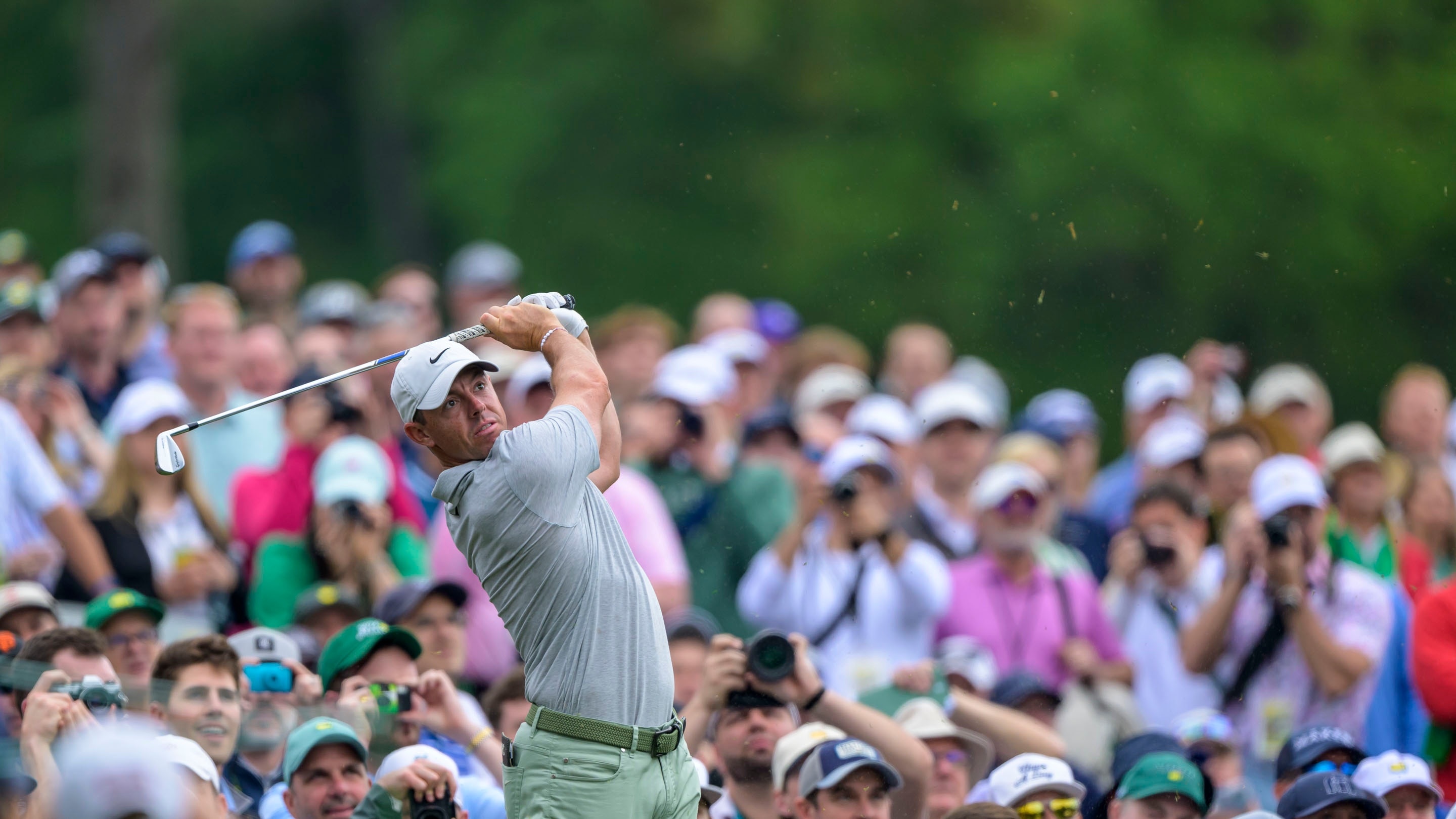 Rory McIlroy of Northern Ireland plays a stroke from the No. 12 tee during practice round 2 ...