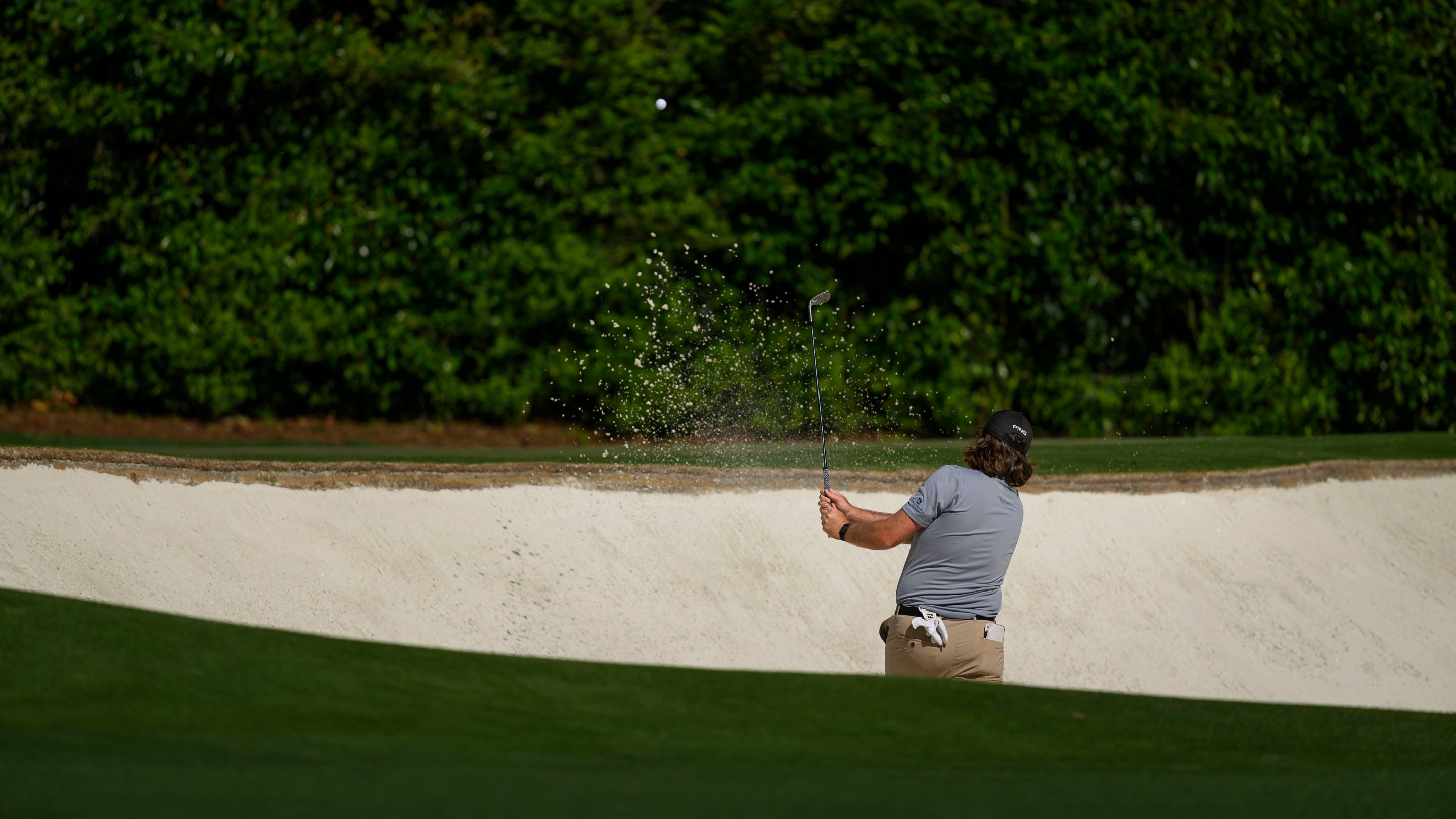 Amateur Neal Shipley of the United States plays a stroke from the ...