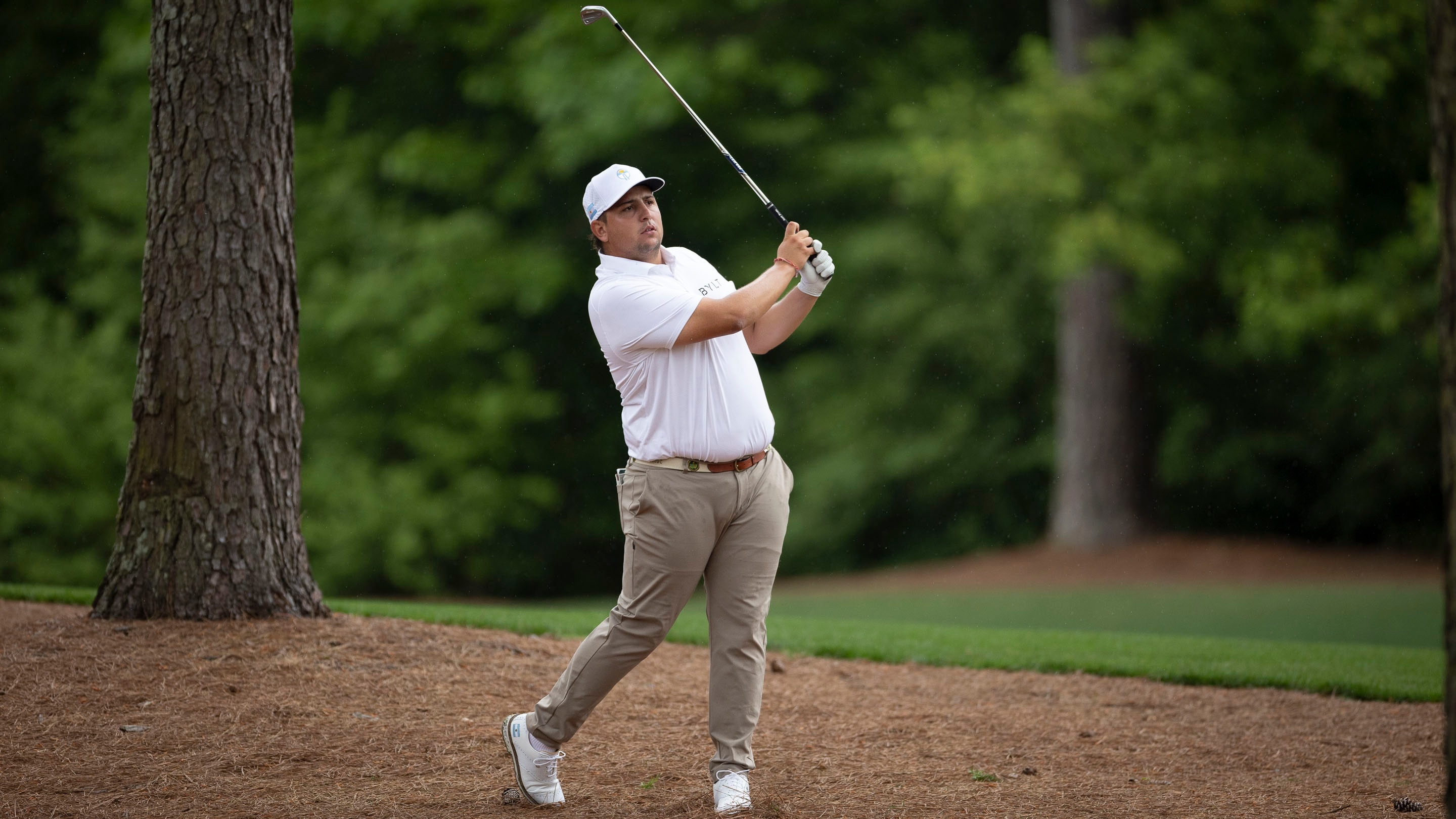 Amateur Mateo Pulcini of Argentina plays his stroke on No. 11 during a ...