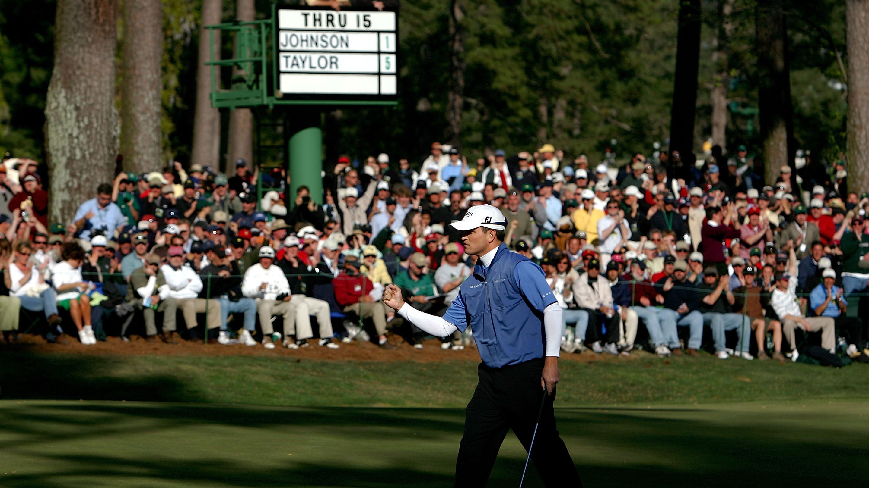 Zach Johnson celebrates his birdie putt on the 16th green during the ...